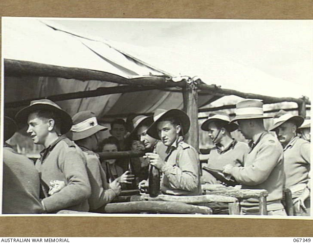 MOUNT GARNET, QLD. 1944-07-15. ARMY PERSONNEL PATRONIZING THE SOFT ...