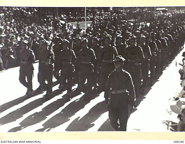 MEMBERS OF THE 2/12TH INFANTRY BATTALION MOVING PAST THE SALUTING BASE ...
