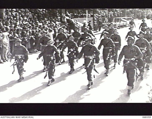 BRISBANE, QLD. 1944-08-08. THE PIPE BAND OF THE 2/25TH INFANTRY ...