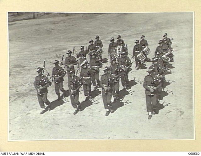 STRATHPINE, QLD. 1944-08-21. MEMBERS OF THE PIPE BAND OF THE 2/31ST ...