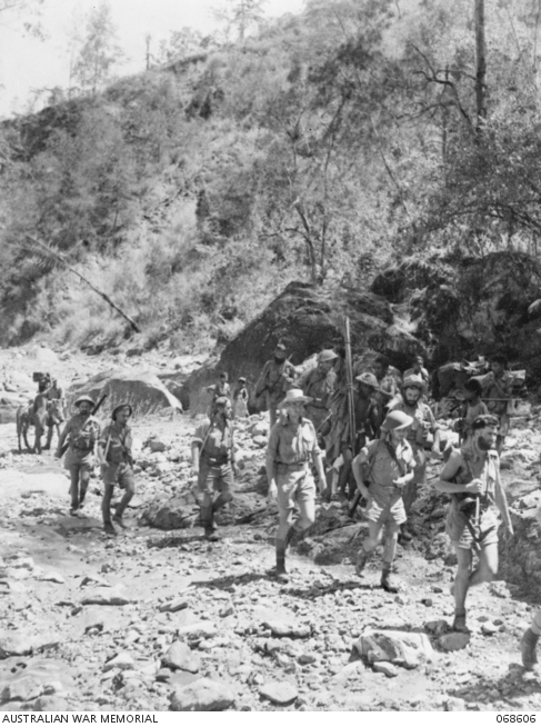 Timor. 1942-12-09. An Australian Army guerilla force moving out of an ...