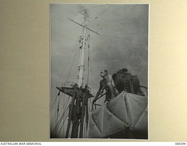 EN ROUTE TO MOROTAI. 1945-07-03. THE MAINMAST OF THE HMAS "WESTRALIA ...