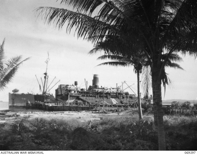MOROTAI, HALMEHERAS. 1945-07-04. THE HMAS "WESTRALIA" BERTHED AT ONE OF ...