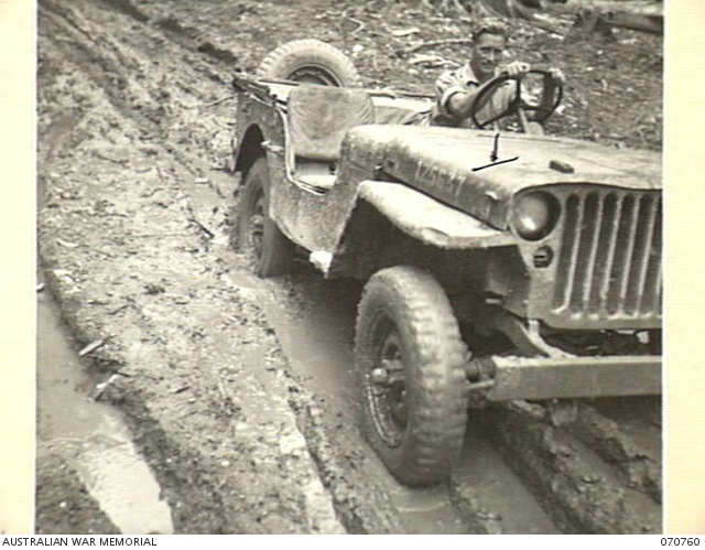 WAMPIT, NEW GUINEA. 1944-03-01. THE ROAD 65 1/2 MILES FROM WAU. AT THIS ...