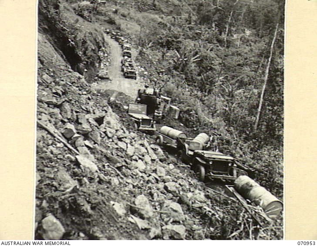 ZENAG, NEW GUINEA, 1944-02-27. A JEEP AND TRAILER CONVOY CONTINUING ...