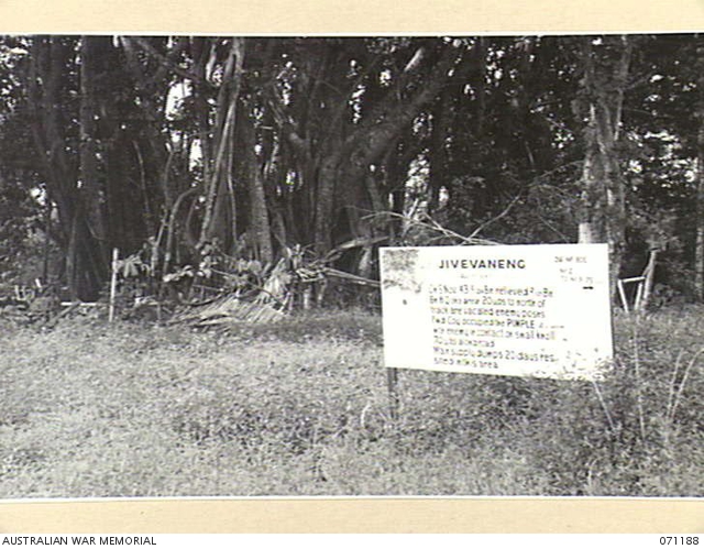 FINSCHHAFEN AREA, NEW GUINEA. 1944-03-17. ONE OF MANY BATTLE SIGNS IN ...