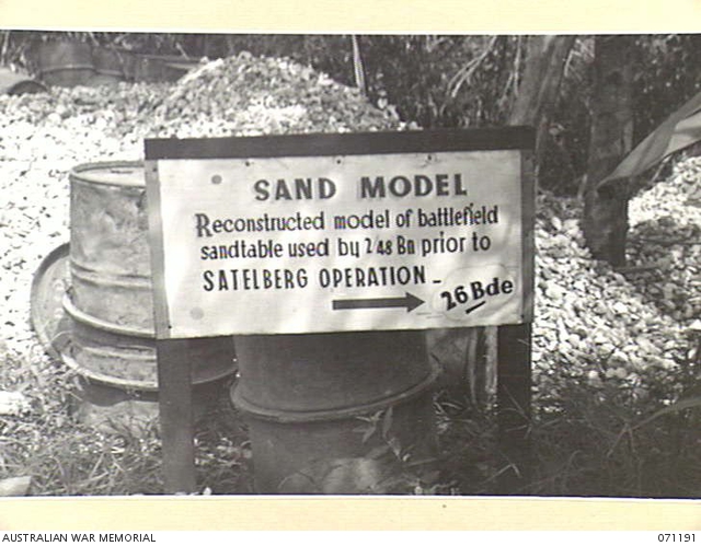FINSCHHAFEN AREA, NEW GUINEA. 1944-03-17. ONE OF MANY BATTLE SIGNS IN ...