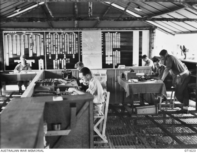 LAE, NEW GUINEA. 1944-03-24. THE ORDERLY ROOM AND ADMINISTRATION STAFF ...
