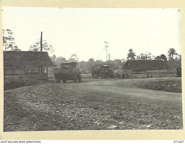 LAE, NEW GUINEA. 1944-03-24. THE VEHICLE ENTRANCE TO HEADQUARTERS LAE ...