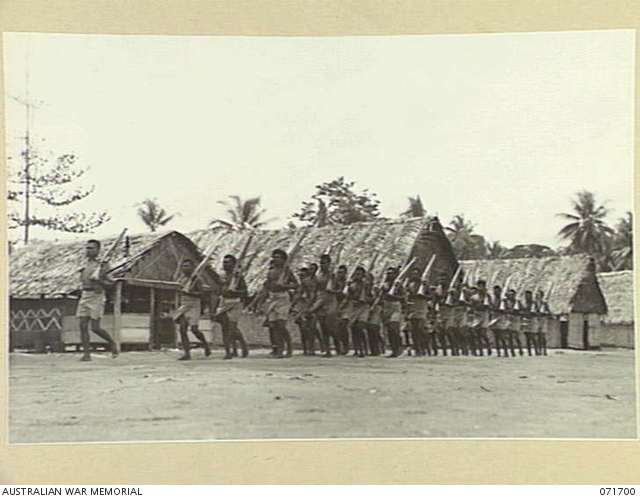 LAE, NEW GUINEA, 1944-03-25. RECRUITS IN THE PAPUAN INFANTRY BATTALION ...