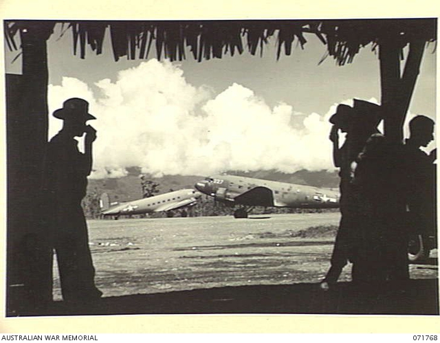 LAE, NEW GUINEA, 1944-03-29. THE LAE AIRSTRIP VIEWED FROM THE YOUNG MEN ...