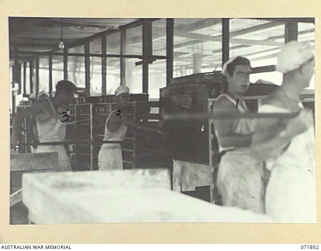 LAE, NEW GUINEA. 1944-03-30. BAKERS OF THE 8TH FIELD BAKING PLATOON ...