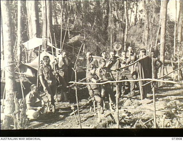 SHAGGY RIDGE, DUMPU VALLEY, NEW GUINEA. 1944-06-018. MEMBERS OF A ...