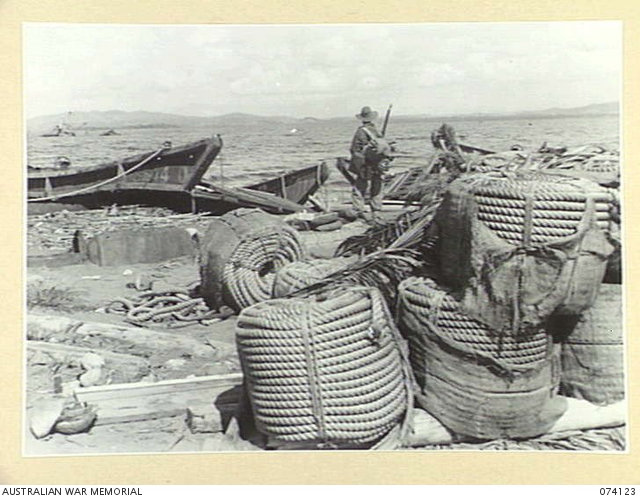 HANSA BAY, NEW GUINEA. 1944-06-17. A MEMBER OF THE 4TH INFANTRY BRIGADE ...