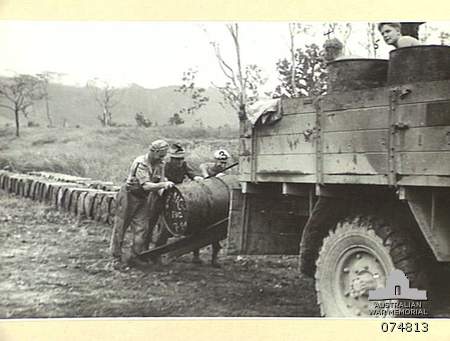 NADZAB, NEW GUINEA. 1944-07-21. TROOPS OF THE 39TH LINES OF ...