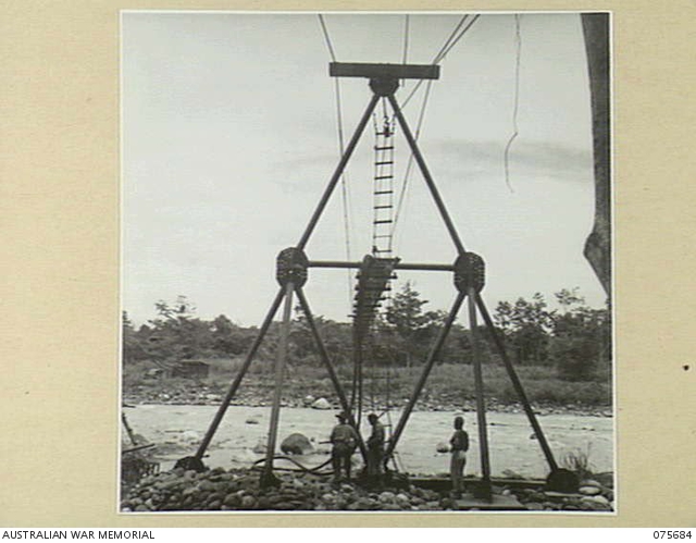 LAE, NEW GUINEA. 1944-09-08. A SECTION OF THE NEW SUSPENSION BRIDGE ...