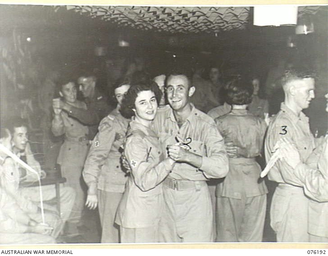 LAE, NEW GUINEA. 1944-09-25. SERGEANT T. RICHARDSON (2), AND SERGEANT A ...