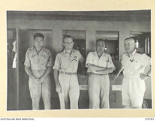 MADANG, NEW GUINEA. 1944-10-31. THE INTELLIGENCE OFFICE STAFF ABOARD ...