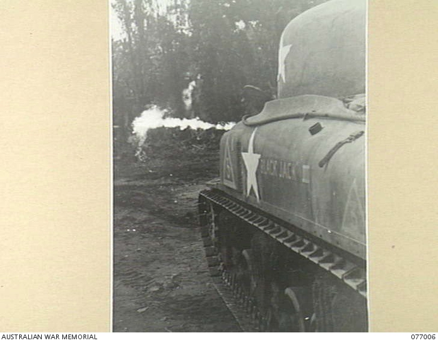 Personnel of the 754th United States Tank Battalion demonstrate a new ...