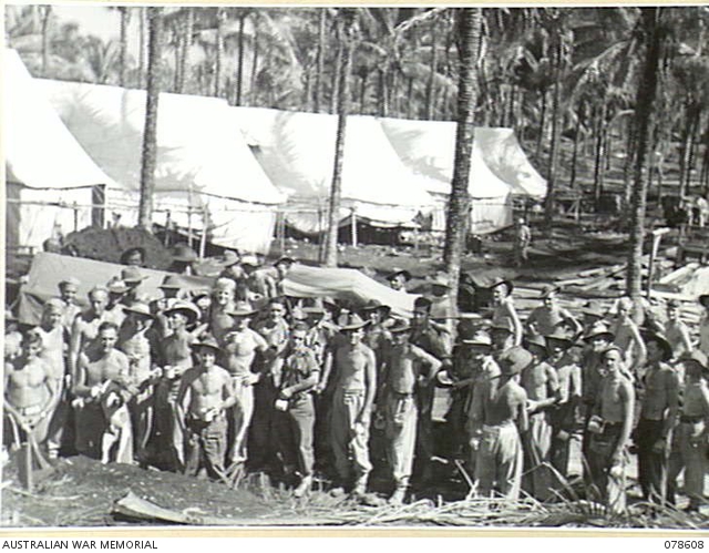 PALMALMAL PLANTATION, NEW BRITAIN. 1945-01-22. TROOPS BUILDING THE 2 ...
