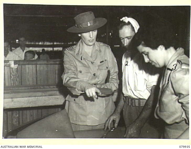 LAE, NEW GUINEA. 1945-03-27. LADY WAKEHURST (1), INSPECTING THE HAD ...