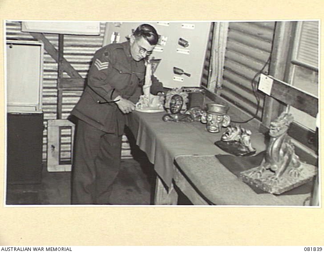 CAMP PELL, MELBOURNE, VIC. 1944-10-30. SERGEANT S.M. REDFERN EXAMINES ...