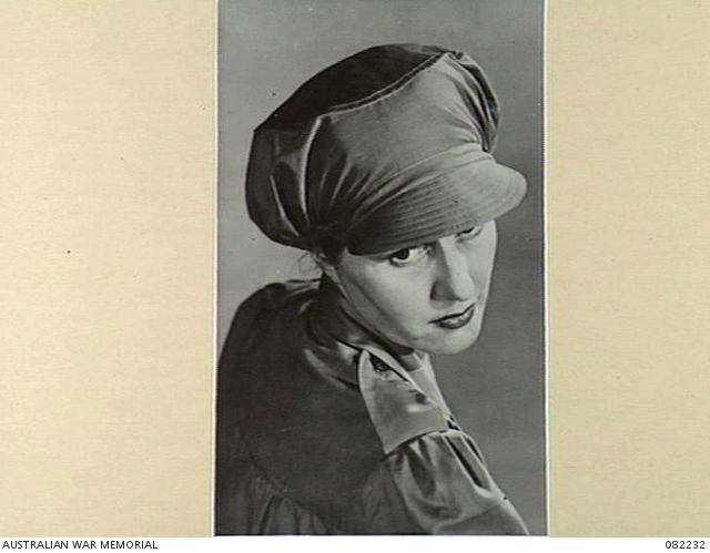 MELBOURNE, VIC. 1944-11-06. THE PROTECTIVE SNOOD WORN ON THE HEAD BY ...