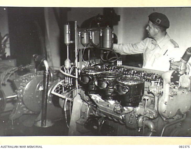 MOOREBANK, NSW. 1944-10-25. CAPTAIN C.M. TEMPEST (1), ALONGSIDE THE GM ...