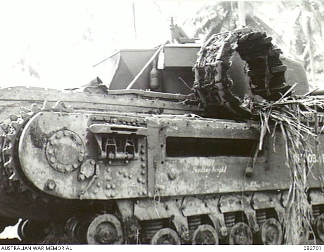 MADANG, NEW GUINEA. 1944-10-12. A CHURCHILL IV TANK WITH THE GUARDS AND MUD PLOUGH REMOVED ...