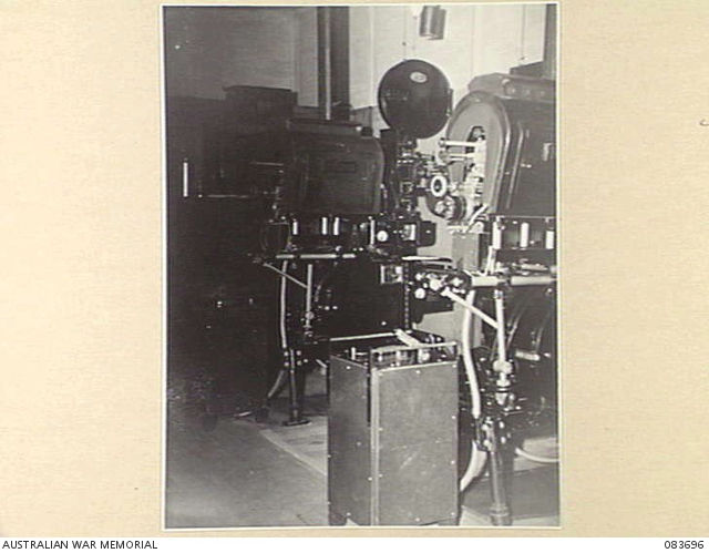 CHERMSIDE, QLD. 1944-12-03. THE PROJECTOR IN OPERATION AT THE CAMP ...