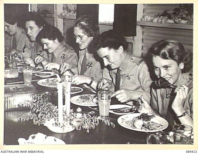 CAMP PELL, VIC. 1944-12-25. AWAS AT 4 AWAS BARRACK ENJOYING THEIR ...