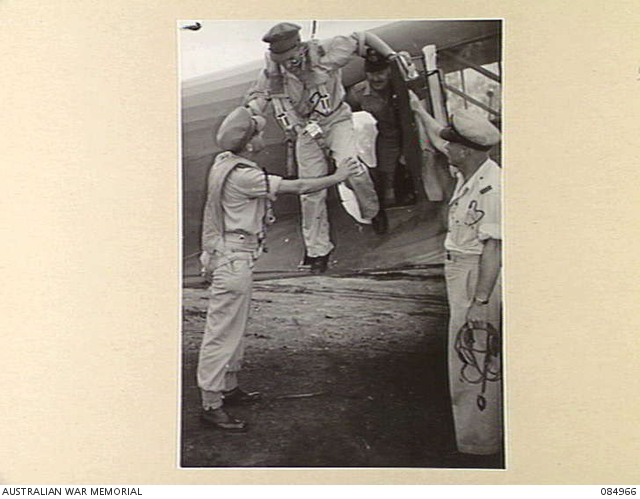 MAREEBA, QLD. 1944-12-23. MEMBERS OF 4 COMD, ARMY LIAISON SECTION, GP ...