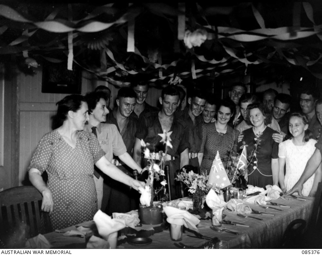 INVERGARRY, QUEENSLAND. 1944-12-24. MRS MCINTYRE, (1), LEADING TROOPS ...