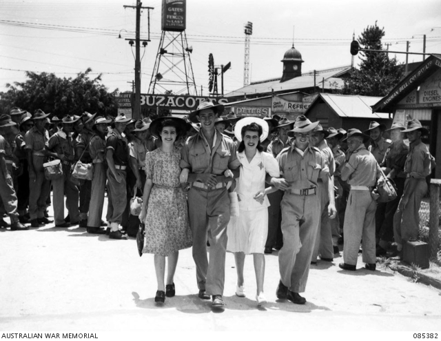 EXHIBITION GARDENS, BRISBANE, QLD. 1944-12-25. TROOPS BEING MET AT THE ...