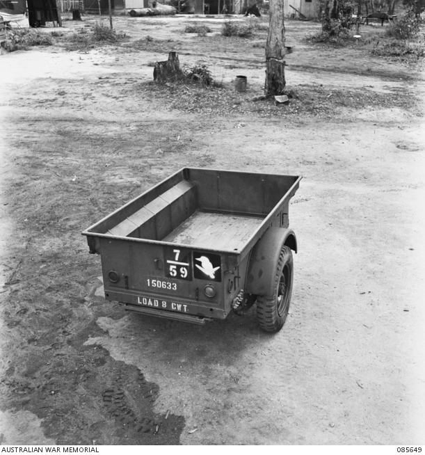 KAIRI, ATHERTON TABLELAND, QLD. 1945-01-14. A JEEP TRAILER AT HQ ...