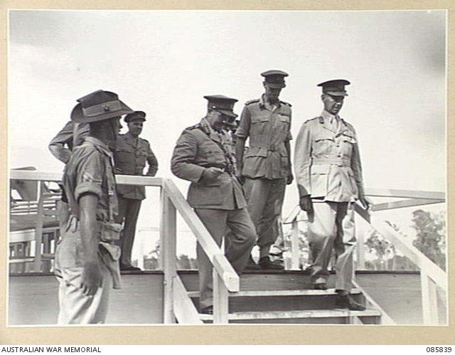 STRATHPINE, QLD. 1945-01-15. SENIOR OFFICERS LEAVE THE DAIS FOLLOWING A ...