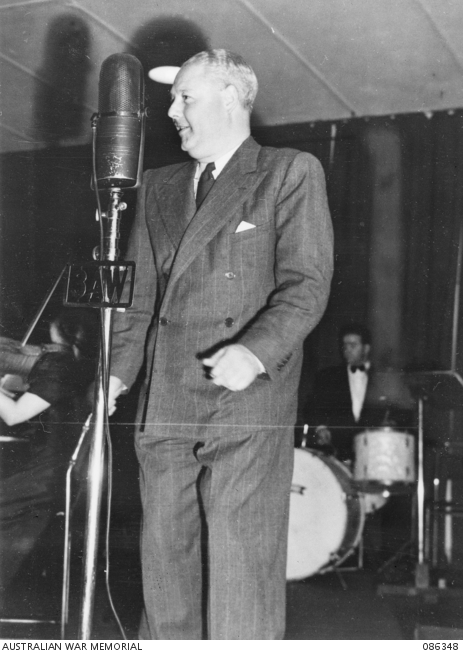 MELBOURNE, VIC. 1945-01-06. MR JACK DAVEY AT 3AW BROADCASTING STUDIO ...