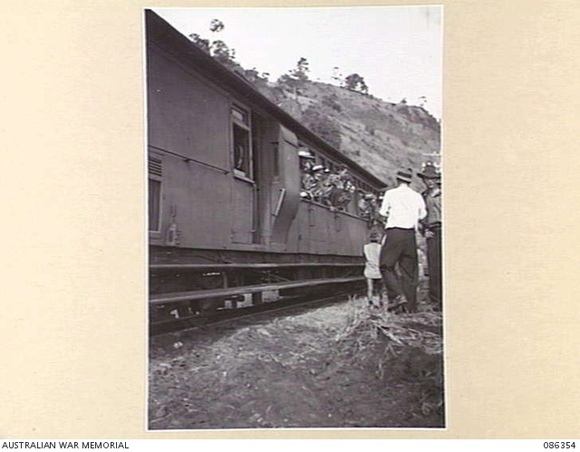 KURANDA, QLD. 1945-02-06. CIVILIANS AND ARMY PERSONNEL FROM THE ...
