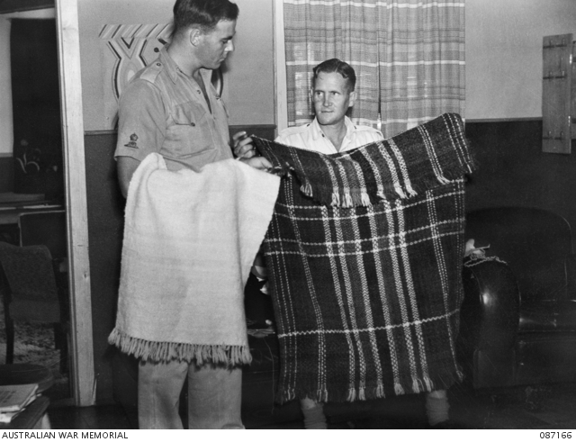 SYDNEY, NSW. 1945-03-01. WARRANT OFFICER 2 C BARRY, (1), WITH PRIVATE N ...
