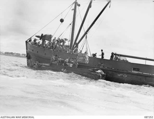 REDCLIFFE, QLD. 1945-03-01. THE SS MARGARET, A 3,000 TON VESSEL, LOADS ...