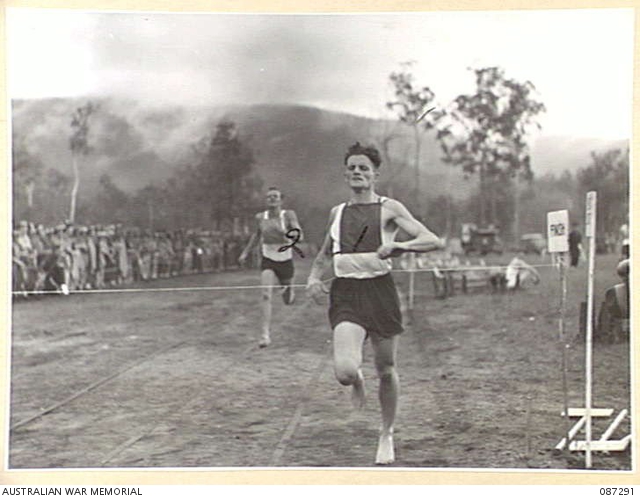 WONGABEL, QLD. 1945-03-02. THE FINISH OF THE 880 YARDS RACE DURING THE ...