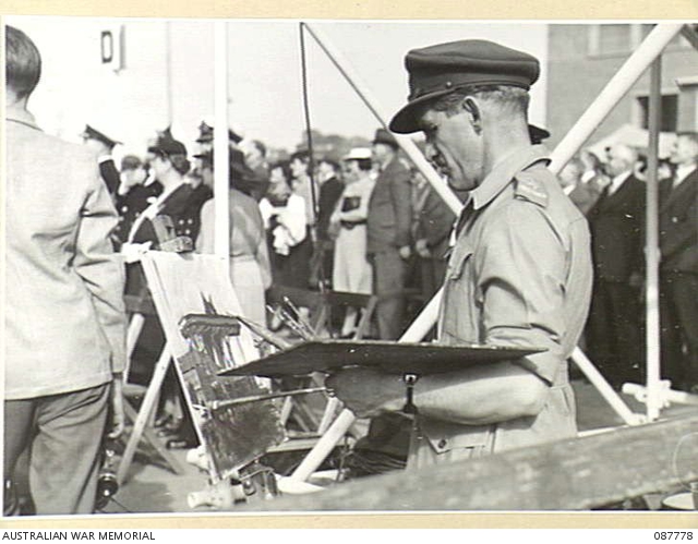 SYDNEY, NEW SOUTH WALES. 1945-03-24. LIEUTENANT H. HANKE, (1), AT WORK ...