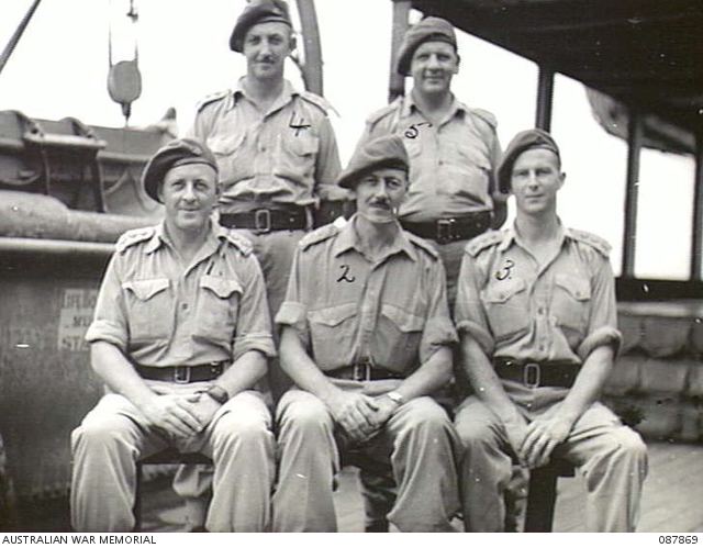 Officers from three ships staff aboard HM Katoomba. Identified, left to ...