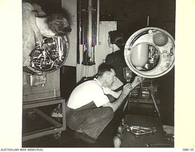 SYDNEY, NEW SOUTH WALES. 1945-04-05. PERSONNEL IN THE TORPEDO FACTORY ...
