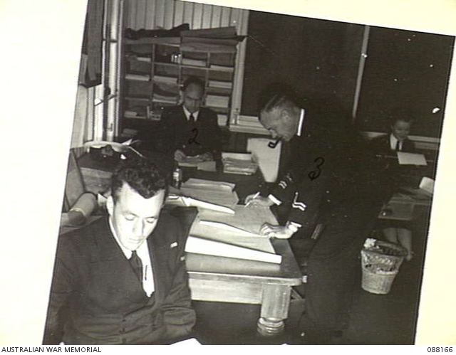 MELBOURNE, VICTORIA. 1945-03. STAFF IN THE COMMANDER'S OFFICER, HMAS ...