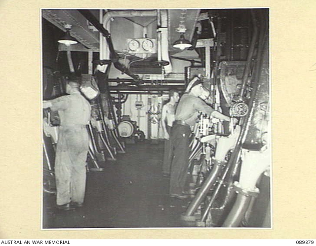 ENGINE ROOM PERSONNEL ABOARD THE TROOPSHIP HMAS KANIMBLA MANOEUVERING ...