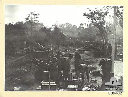 TARAKAN ISLAND, BORNEO, 1945-05-02. GUNS 1 AND 2 OF CORPS TROOP, 2/7 ...