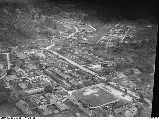 TARAKAN, BORNEO, 1945-05-07. AERIAL VIEW OF TARAKAN TOWN SHOWING THE ...
