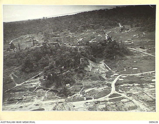 TARAKAN, BORNEO, 1945-05-07. TARAKAN TOWNSHIP VIEWED FROM THE CREST ...