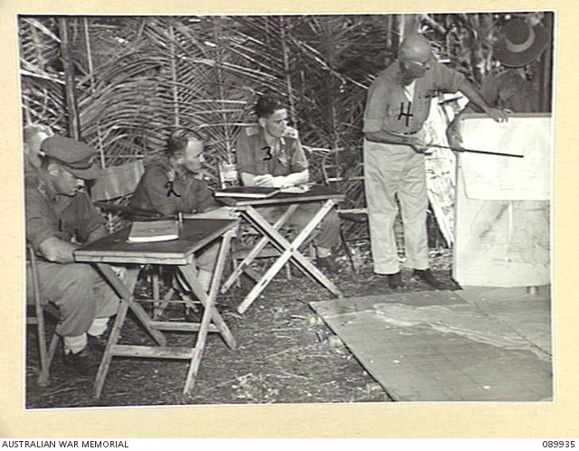 MOROTAI. 1945-05-17. DURING THE BRIEFING OF 24 INFANTRY BRIGADE FOR ...